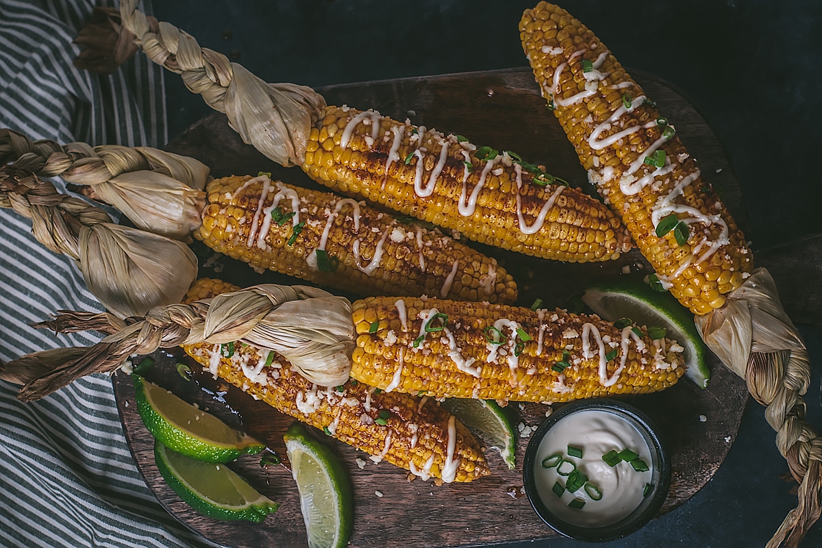 Sweet & Spicy Corn on the Cob in the Oven with Husks - Gimme From Scratch